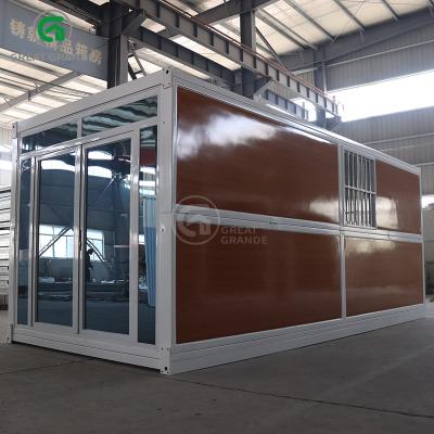 China Windproof And Warm 20ft Fold Out Container Homes Wood Grain Glass Manufacturer Te koop