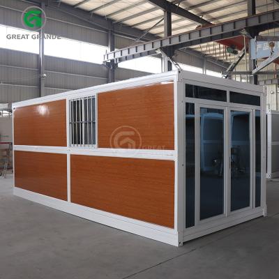 Cina Shockproof Fold Out Container Homes Wood Grain Glass Quick Setup in vendita