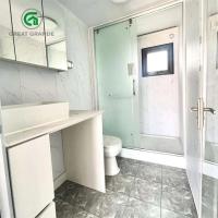 China 20ft Foldable Tiny House Manufacturer Customized Dark Gray Wall Panels Frame Rainproof Windproof for sale