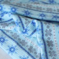 China Snowflake Pattern Micro Fleece Fabric One Side Printed Jacquard for sale