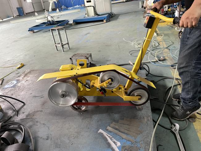 TCM-XTC manual polisher grinder machine in operation