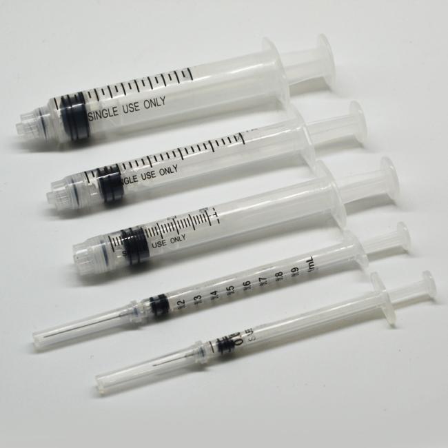 Disposable Sterile Safety Retractable Auto Disable Vaccine Injection Syringe 0.1ml 0.5ml 1ml-10ml with Needle Luer Slip CE ISO