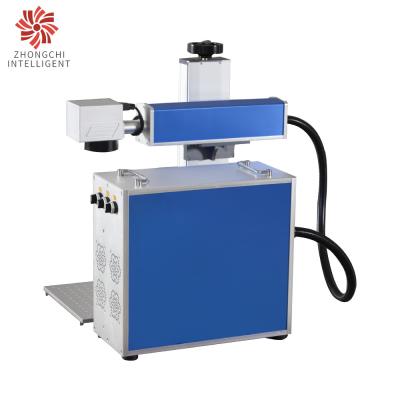 Cina macchina da tavolino 7000mm/S, bevanda Mini Fiber Laser Marker della marcatura del laser 30W in vendita
