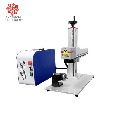 Cina macchina tenuta in mano, 7000mm/s Mini Engraving Laser Machine della marcatura del laser di 20W 30W in vendita