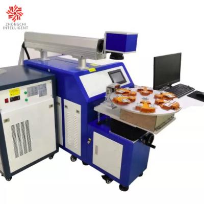 Cina saldatore a fibra ottica 2000W, macchina del laser di 1000W 1500W della saldatura a laser della lettera di Manica in vendita