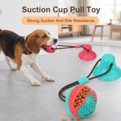 China Durable Dog Leash Ball Pull Toy With Suction Cup Dog Chew Toy Cartoon Rubber Molar Teething Suction Cup Leaking Food Toy for sale
