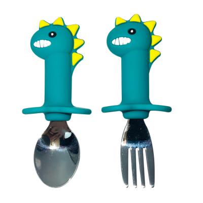 China Cute Animal Shape Silicone Baby Spoon Cartoon Dinosaur Short Handle Fruit Table Fork Children's Feeding Spoon for sale