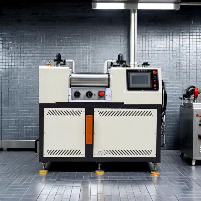 China Two Roll Mill with SUS304 Stainless Steel Hopper Adjustable Roller Spacing and High Speed Mixer for Rubber Mixing for sale