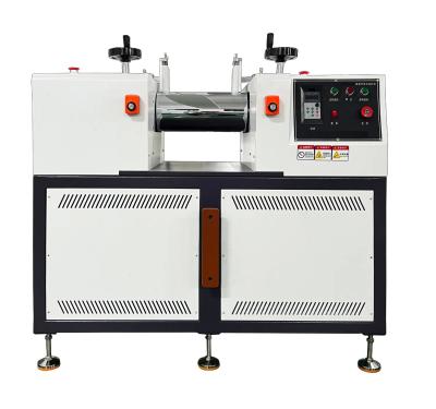 China Two Roll Mill with SUS304 Stainless Steel Hopper Adjustable Roller Spacing and High Speed Mixer for Rubber Mixing for sale