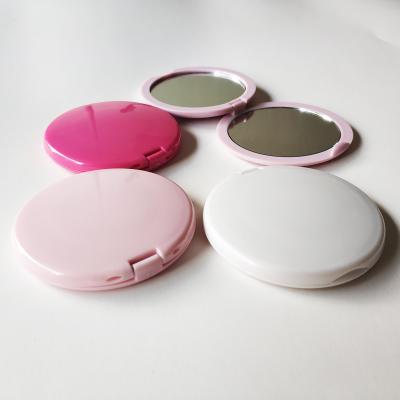 China Magnification foldable travel double side small beauty make up plastic cosmetic pocket compact makeup mirror for sale