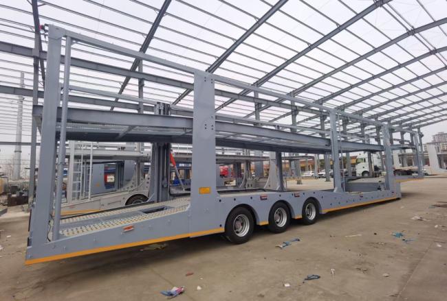 Close-up of trailer's hydraulic system and structural details