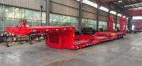 China 30-100 Tons Van Type Flatbed Semi Trailer 3 Axles Multi Function Skeleton Semi Trailer for sale