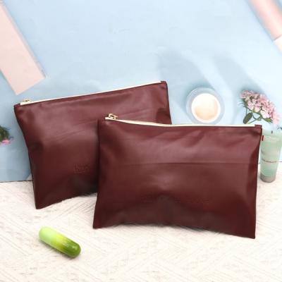 China Cosmetic Zipper Pu Leather Bag Waterproof Embossed Logo Printing for sale