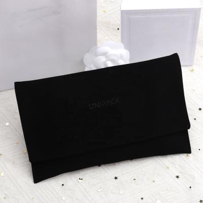 China Cosmetic Luxury Gift PU Leather Envelope Wallet Black Waterproof Custom Embossed for sale