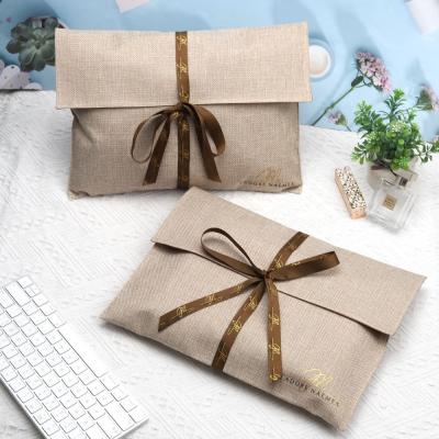 China Ribbon Luxury Envelope Jute Bag Dustproof Hair Packing With Satin Lining for sale