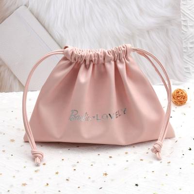 China Cosmetic Pu Leather Drawstring Bag Luxury Waterproof Custom Logo Printed 20x15 for sale
