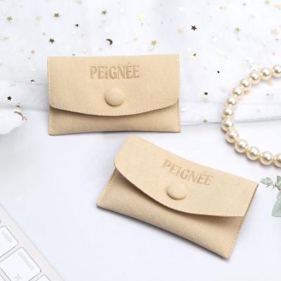 China Luxury Envelope Microfiber Jewelry Pouch With Button Embossing Logo for sale