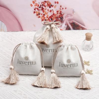 China Cotton Linen Drawstring Gift Pouch Custom Logo Printing With Tassel for sale