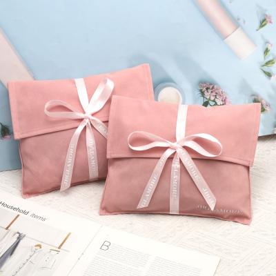 China Pink Flap Envelope Velvet Dust Bag With Ribbon Custom Logo Tear Resistant for sale