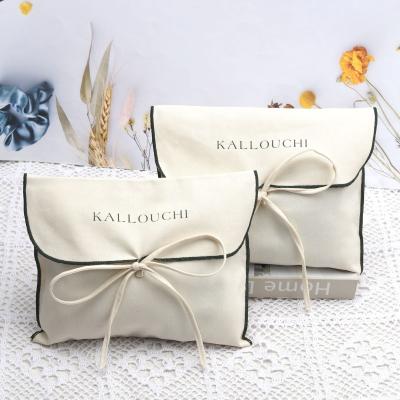 China Recyclable Cotton Twill Envelope Packing Bag for Luxury Custom Logo Clothes Dust Bag for sale