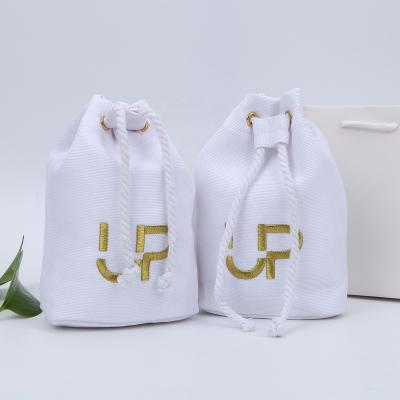 China Custom Embroidery Canvas Drawstring Pouch  Golf Balls Storage Bag for Cosmetics Products for sale
