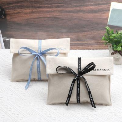 China Natural Canvas Envelope Clothes Packaging Bag Dustproof for Handbag Cap Packing for sale