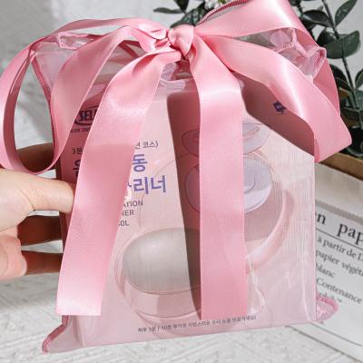 China Custom Luxury Organza Packaging Pouch With Bow Pink Organza Gift Packing Bow Stripe Bag for sale