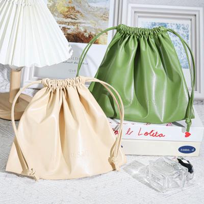 China Custom Pu Leather Drawstring Storage Pouch For Cosmetic Skincare Perfume High Quality Waterproof Pu Leather Drawstring Dust Bag for sale