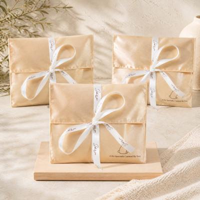 China Luxury Smooth Satin Envelope Wig Packaging Pouch with Ribbon Custom logo Printing Satin Envelope Cosmetic Gift Bag for sale