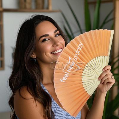 China Custom Printed Folding Hand Fan Personalized Silk Bamboo Fan with Decorative Painting for Festivals Promotions Music Events for sale