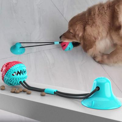 China Heavy-Duty TPR Dog Chew Toy with Suction - Grind-to-Eat Food Dispenser Ball for sale
