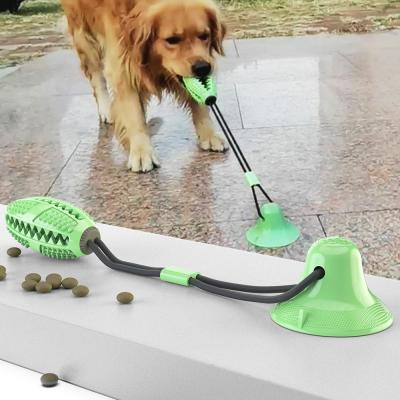 China Heavy-Duty TPR Dog Chew Toy with Suction - Grind-to-Eat Food Dispenser Ball for sale