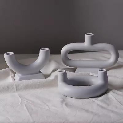 China Unique Round Candlestick Ornament Display Modern Wedding Double Tube Ceramic Candle Container for sale