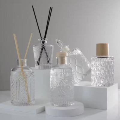 China Irregular Empty Reed Diffuser Bottles Unique Glass Reed Diffuser Bottle Luxury for sale