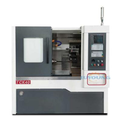 China 2100x1450x1850mm TCK40 Slant Bed Machine CNC Gang Type Lathe Tool Holder for sale