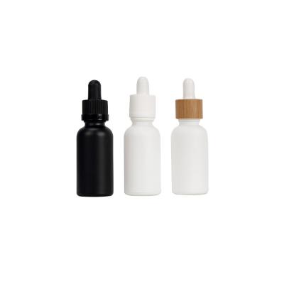 China Customized Printing Color Dropper Bottle for Essential Oil and Serum  Child Resistant Black Glass Bottle with Dropper for sale