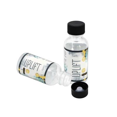 China 30ml Round Skin Care Cosmetics Glass Essential Oil Bottle with Label for sale