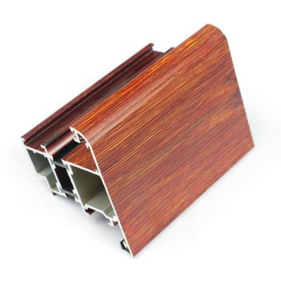 China Thermal Break Bridge Wood Grain Aluminium Door And Window Frames for sale