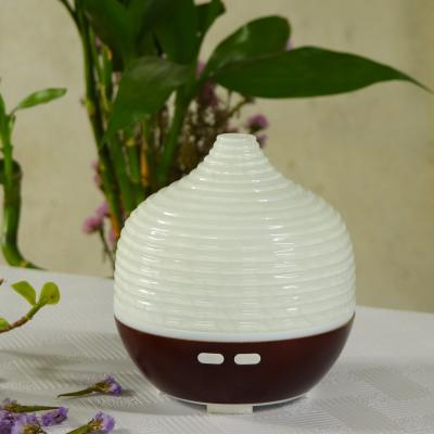 China 7 Color Changing LED Light Aromatherapy Essential Oil Diffuser air ultrasonic humidifier Light Wood color GK-YX-234 for sale