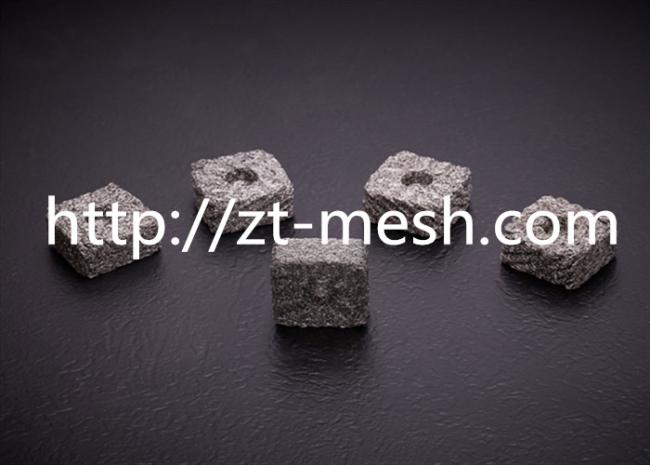 Compressed Knitted Wire Mesh in industrial application setting