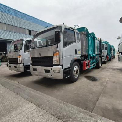 China HOWO Automated Side Load Garbage Truck Medical Waste Collection Truck for sale