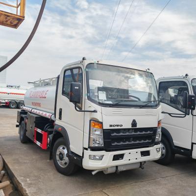 China HOWO RHD Fuel Oil Tank Truck 8000 Liters Mobile Refueling Truck 154HP for sale