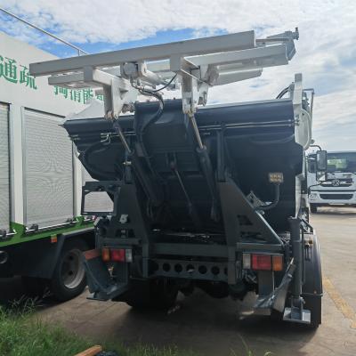 China Isuzu Rear Loader Garbage Truck  Food Waste Disposal Truck For Efficient Garbage Compression for sale