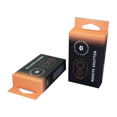 China Bluetooth Selfie Stick Box Recycled Customized Remote Shutter Box With Hook for sale