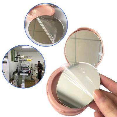 China Printing Color Transparent Self-Adhesive Plastic Flim Pet Cosmetic Mirror Sheet Glass Lens Peelable Protective Film for sale