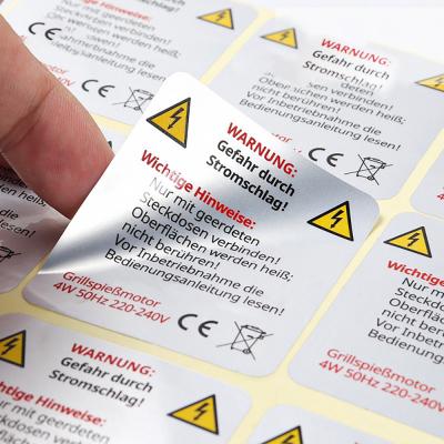 China Oil Proof Matte Silver PVC Sticker Labels Custom Printed Strong Adhesive Labels for sale