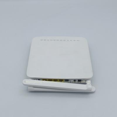 中国 FTTH modem F670L GPON ONU 4GE 1TEL 2.4G 5G WIFI XOPN dual band wifi ont 販売のため