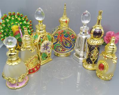 China Pigment bottles metal oil bottle cosmetics perfume bottle glass bottle for sale