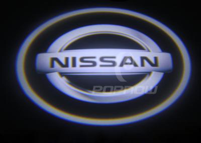 Cina il proiettore di logo della luce/IP67 LED del proiettore della porta di automobile di 210lm NISSAN LED si accende in vendita