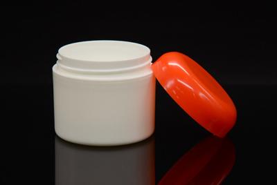中国 ローションのためのオレンジ帽子が付いている円形 50ml プラスチックびんの小さい化粧品の瓶 販売のため